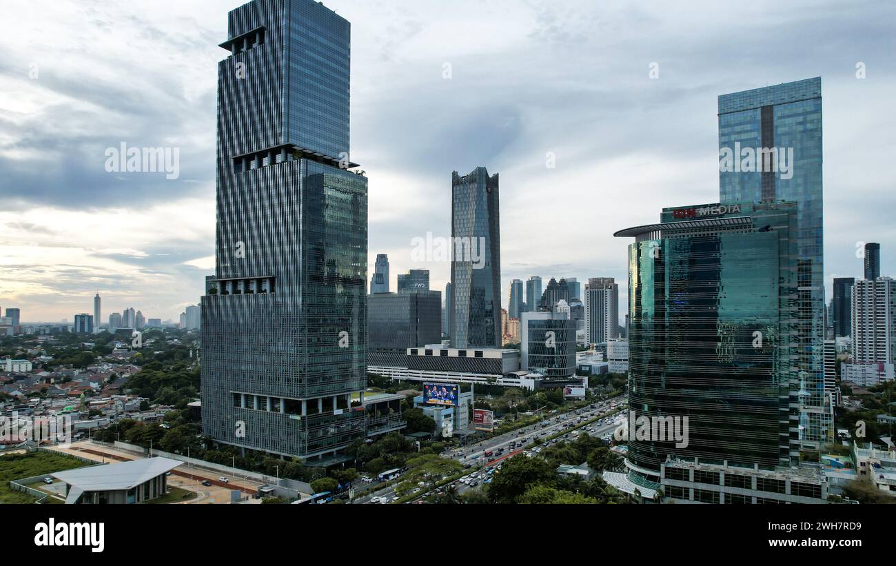 Panoramic cityscape of Indonesia capital city Jakarta at sunset. A rare ...