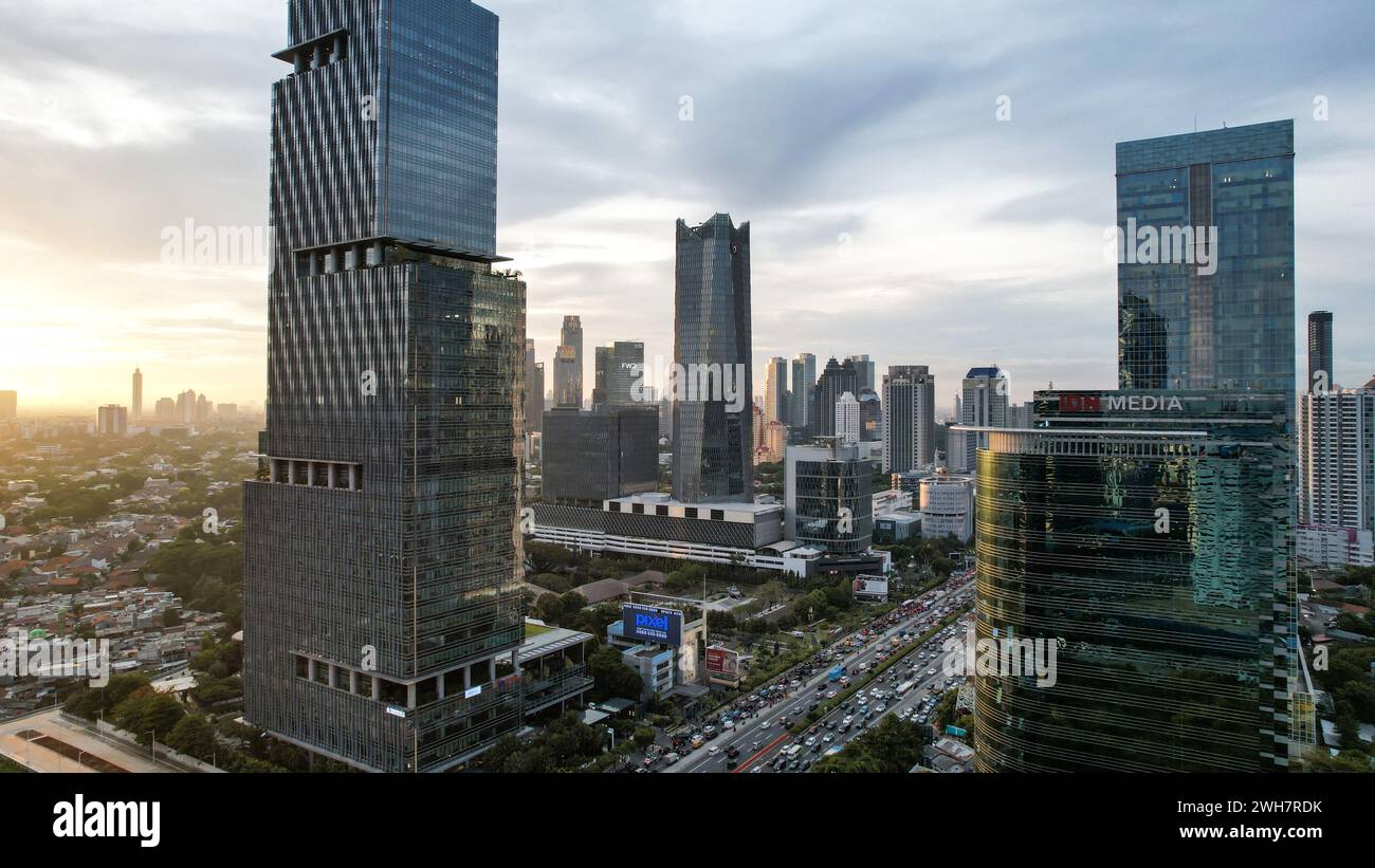 Panoramic cityscape of Indonesia capital city Jakarta at sunset. A rare ...
