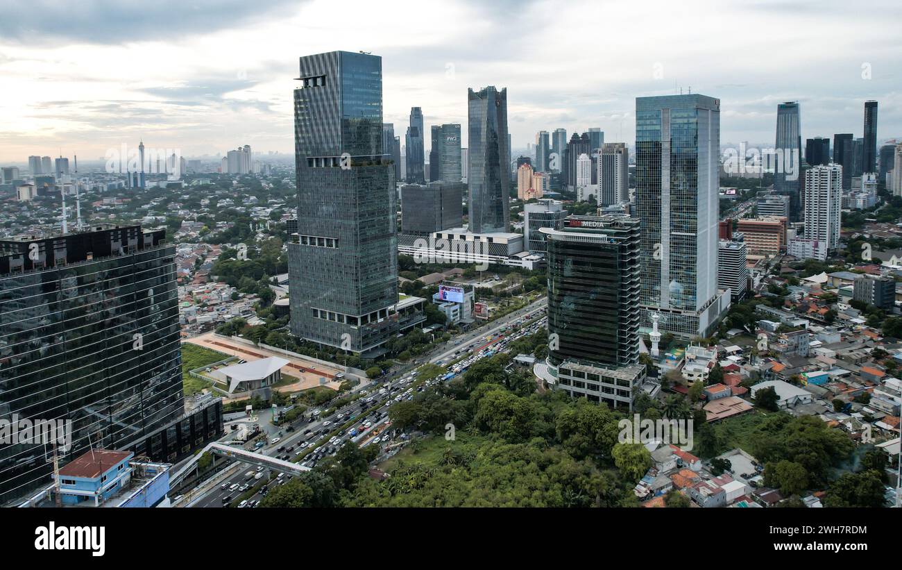 Panoramic cityscape of Indonesia capital city Jakarta at sunset. A rare ...
