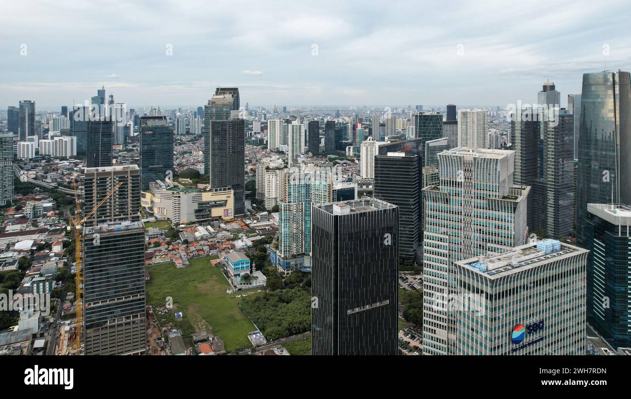 Panoramic cityscape of Indonesia capital city Jakarta at sunset. A rare ...