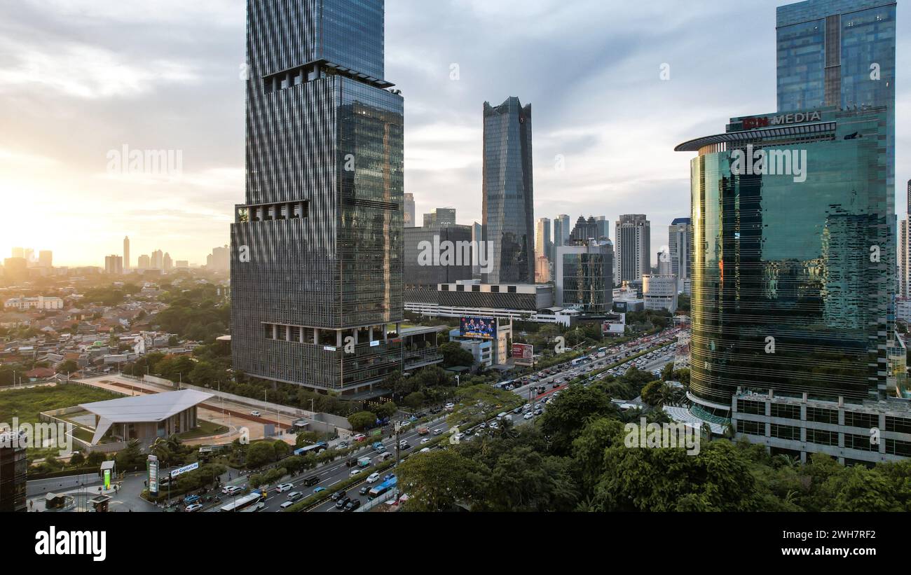 Panoramic cityscape of Indonesia capital city Jakarta at sunset. A rare ...