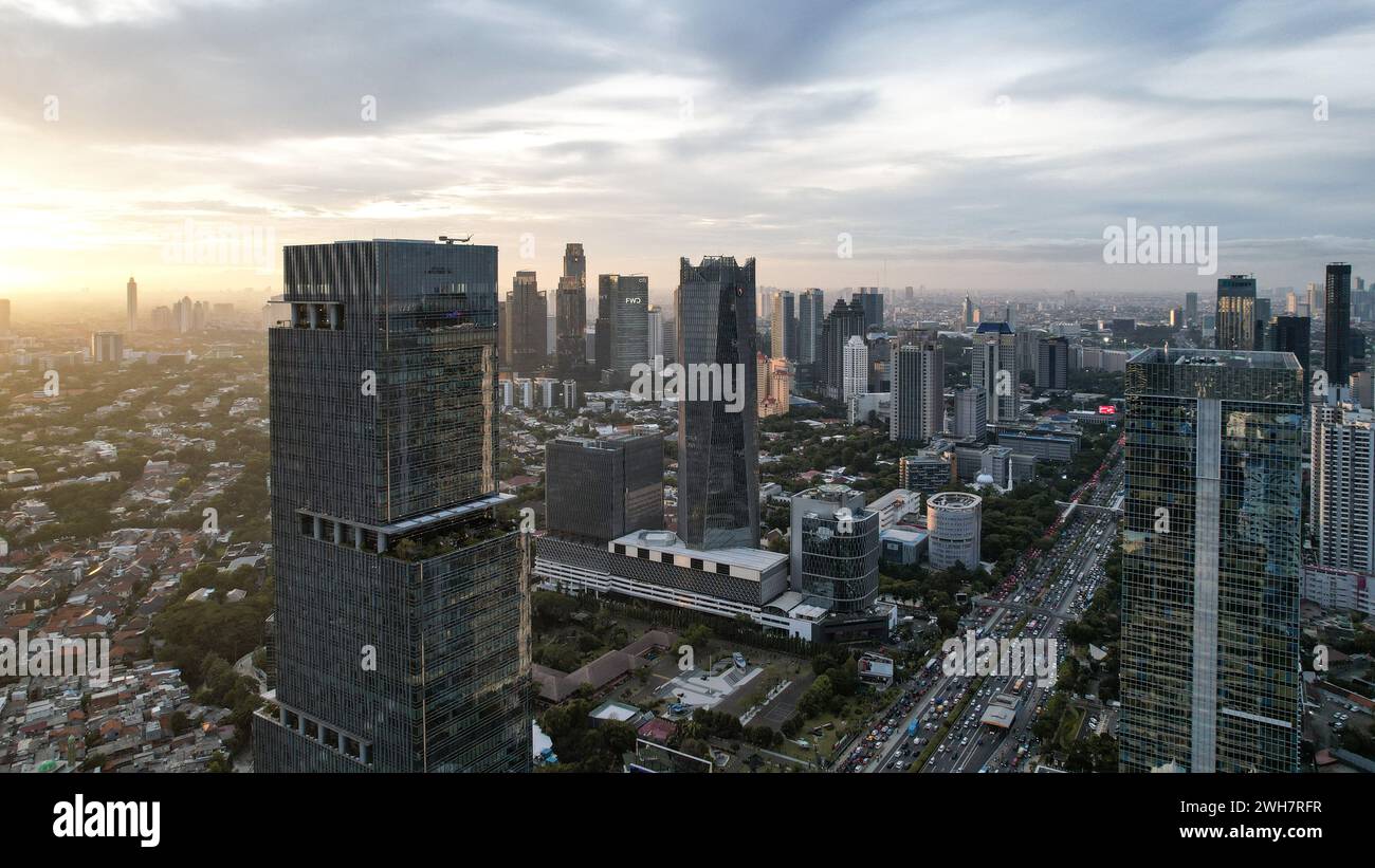 Panoramic cityscape of Indonesia capital city Jakarta at sunset. A rare ...