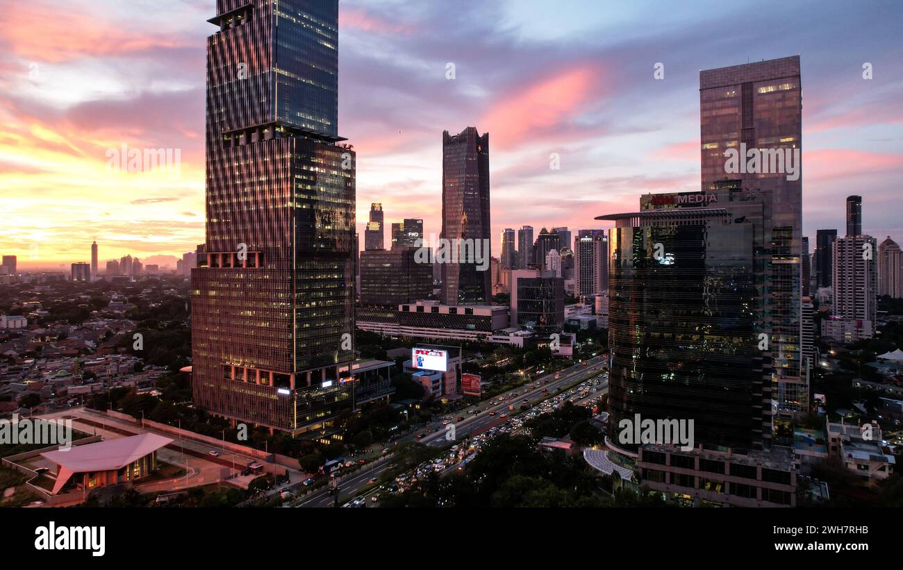 Panoramic cityscape of Indonesia capital city Jakarta at sunset. A rare ...