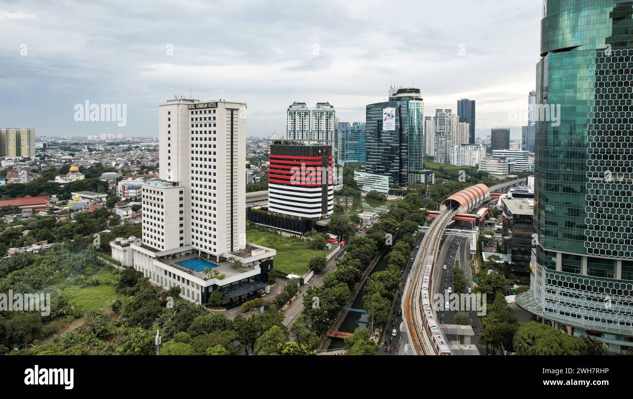 Panoramic cityscape of Indonesia capital city Jakarta at sunset. A rare ...