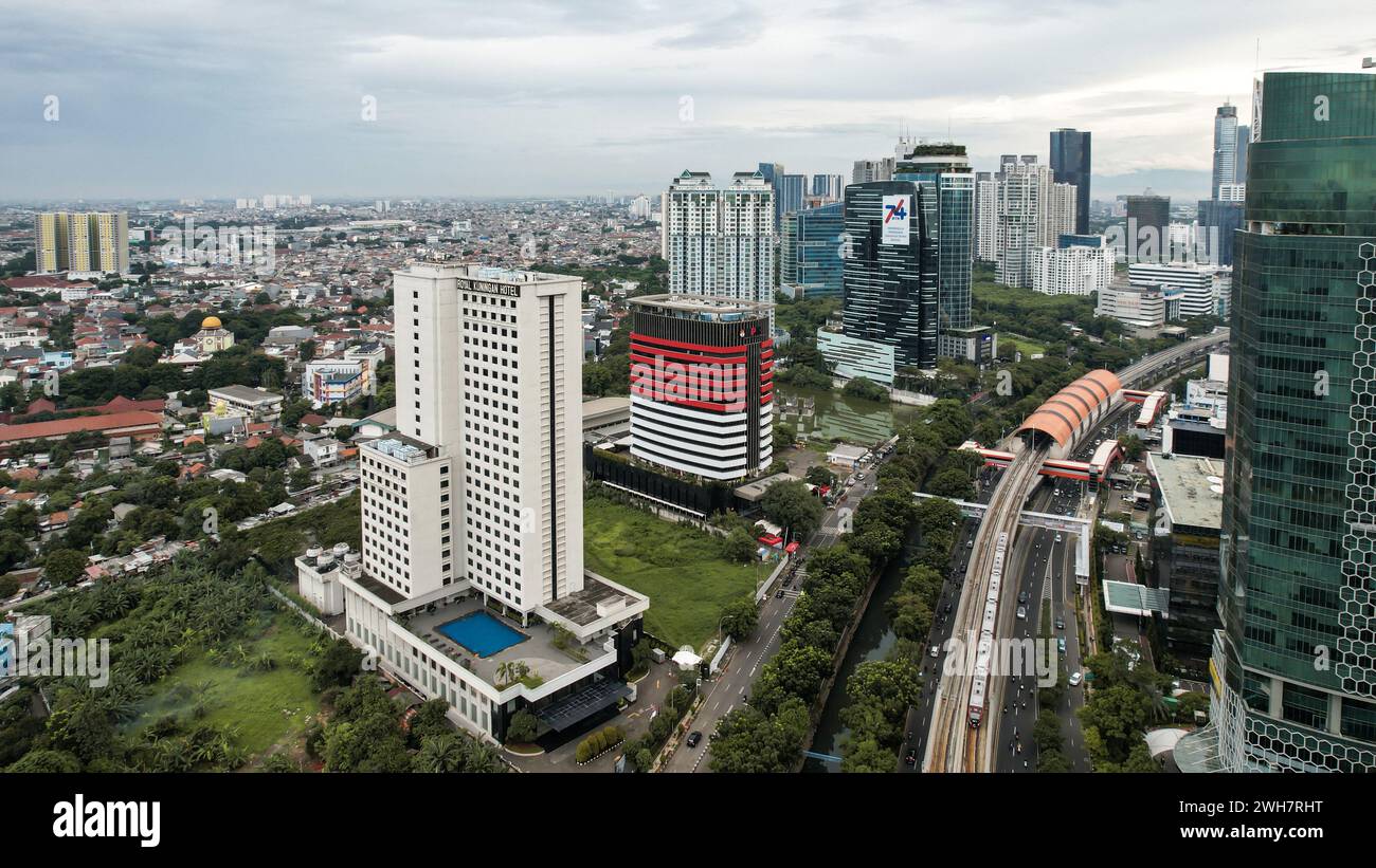 Panoramic cityscape of Indonesia capital city Jakarta at sunset. A rare ...