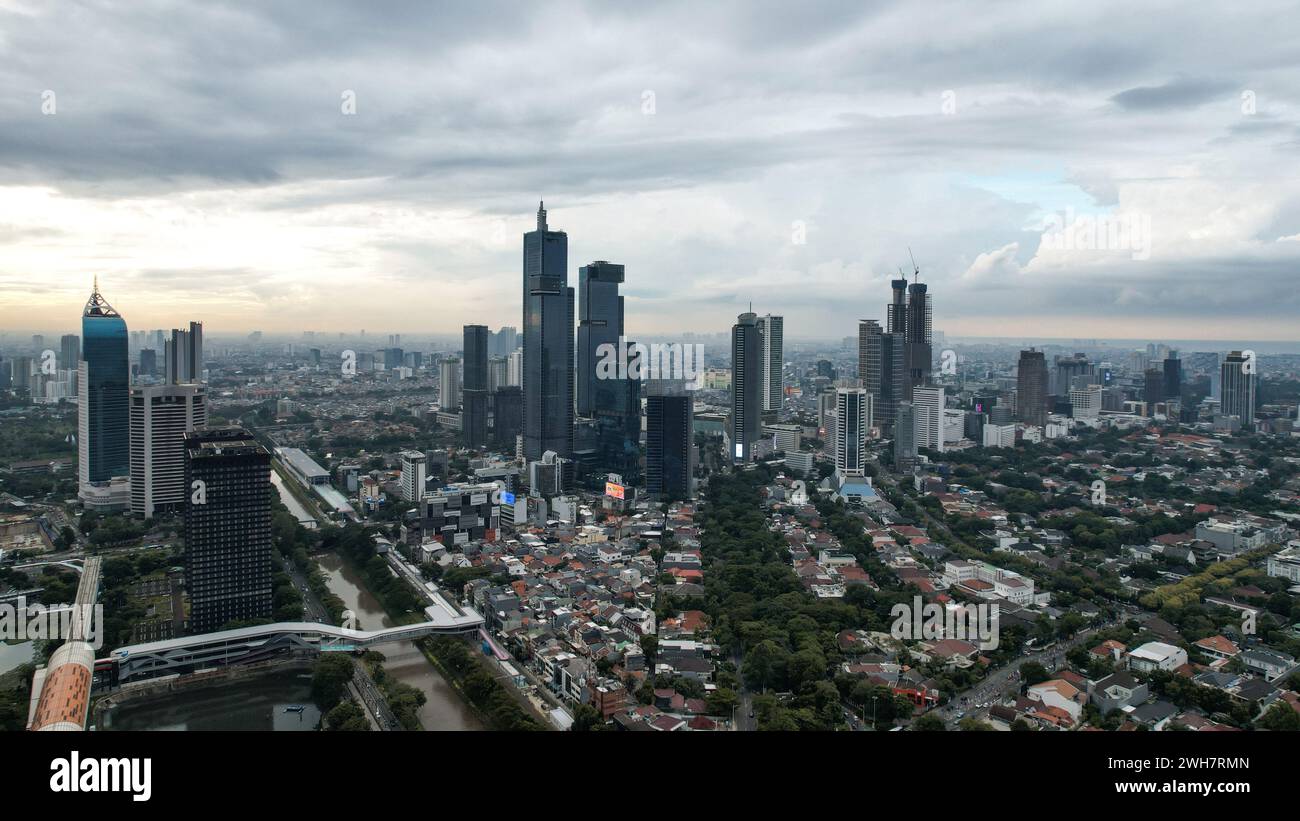 Panoramic cityscape of Indonesia capital city Jakarta at sunset. A rare ...