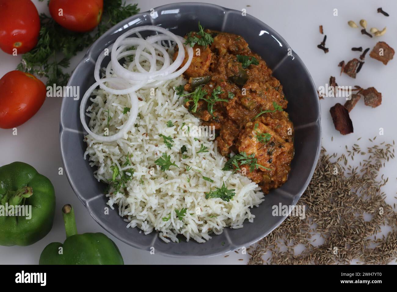 Jeera Bhaat or Jeera Rice served with paneer masala curry. Delicious ...
