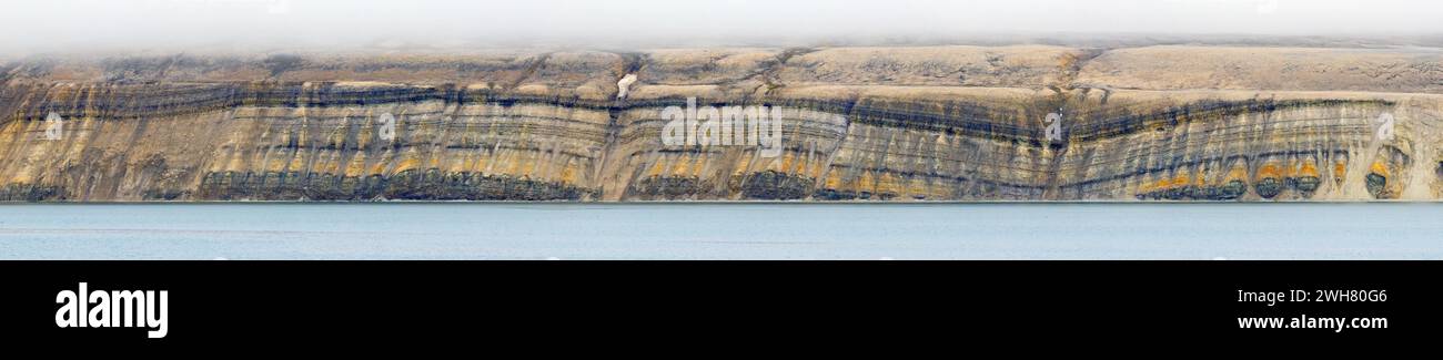 Sea cliff showing limestone and sandstone strata from the Permian ...