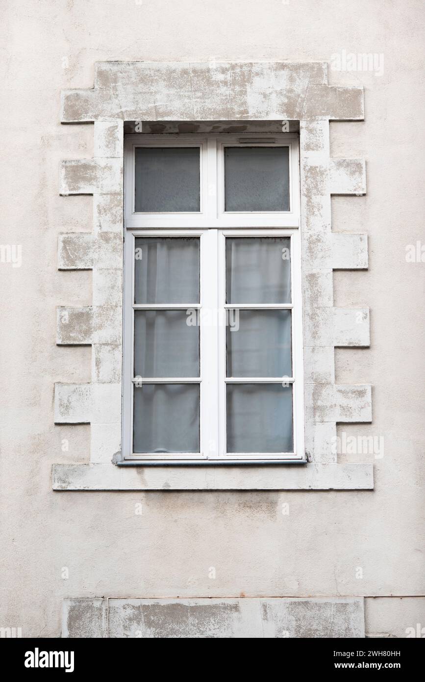 Facade with windows in an old tenement house in France, French ...