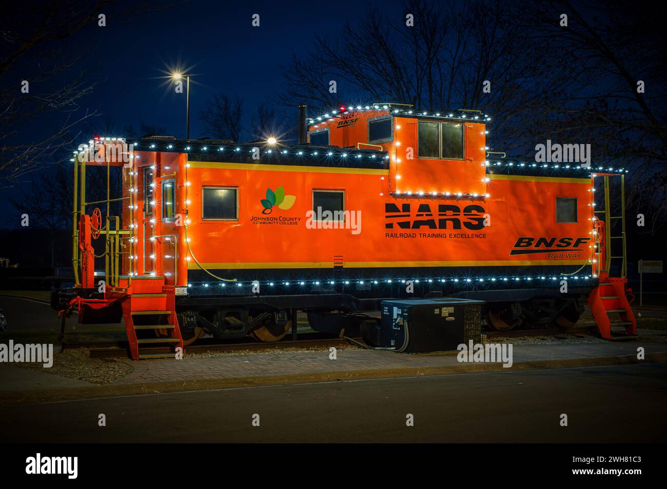 Illuminated caboose adorned with festive Christmas lights Stock Photo ...