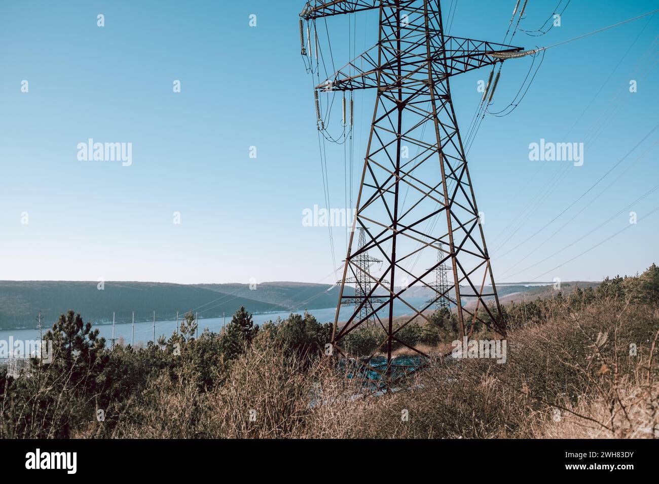 Electrical equipment, high voltage power line insulators on winter sky ...