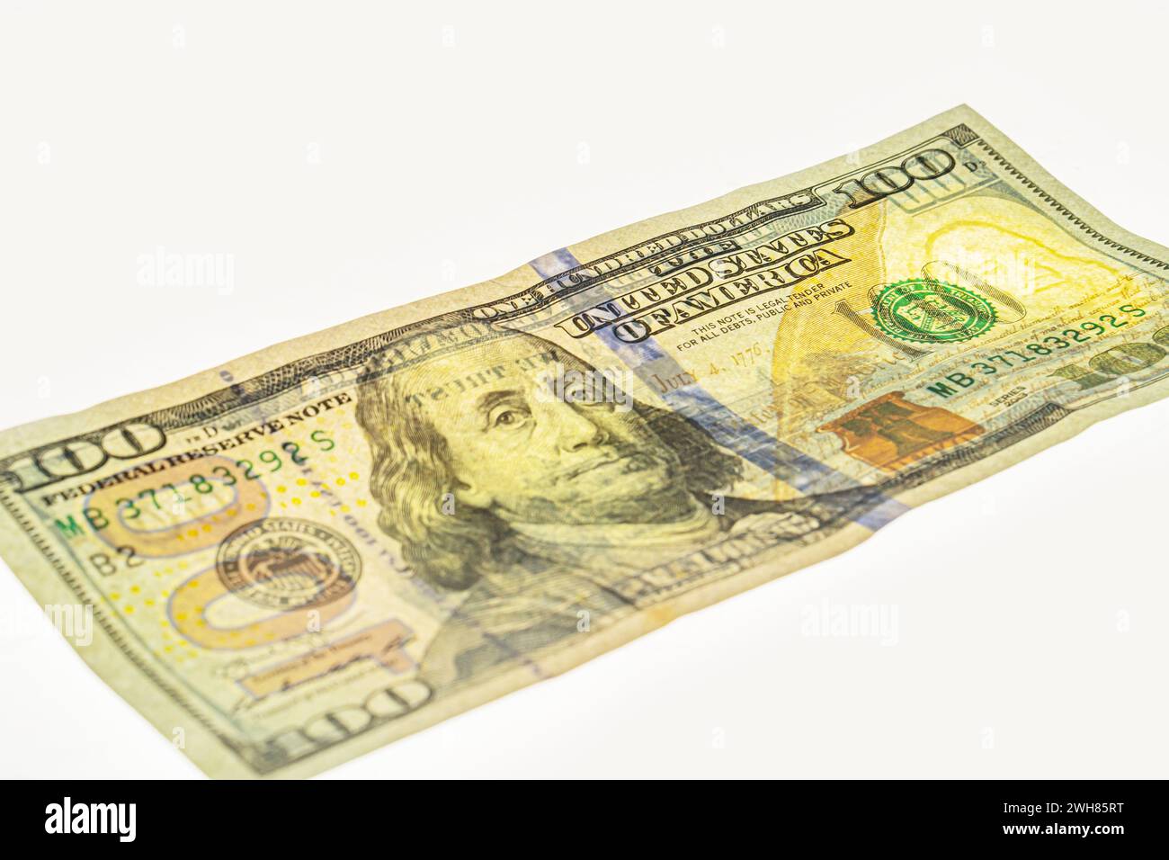 fragment of 100 dollar banknote with visible details of banknote ...