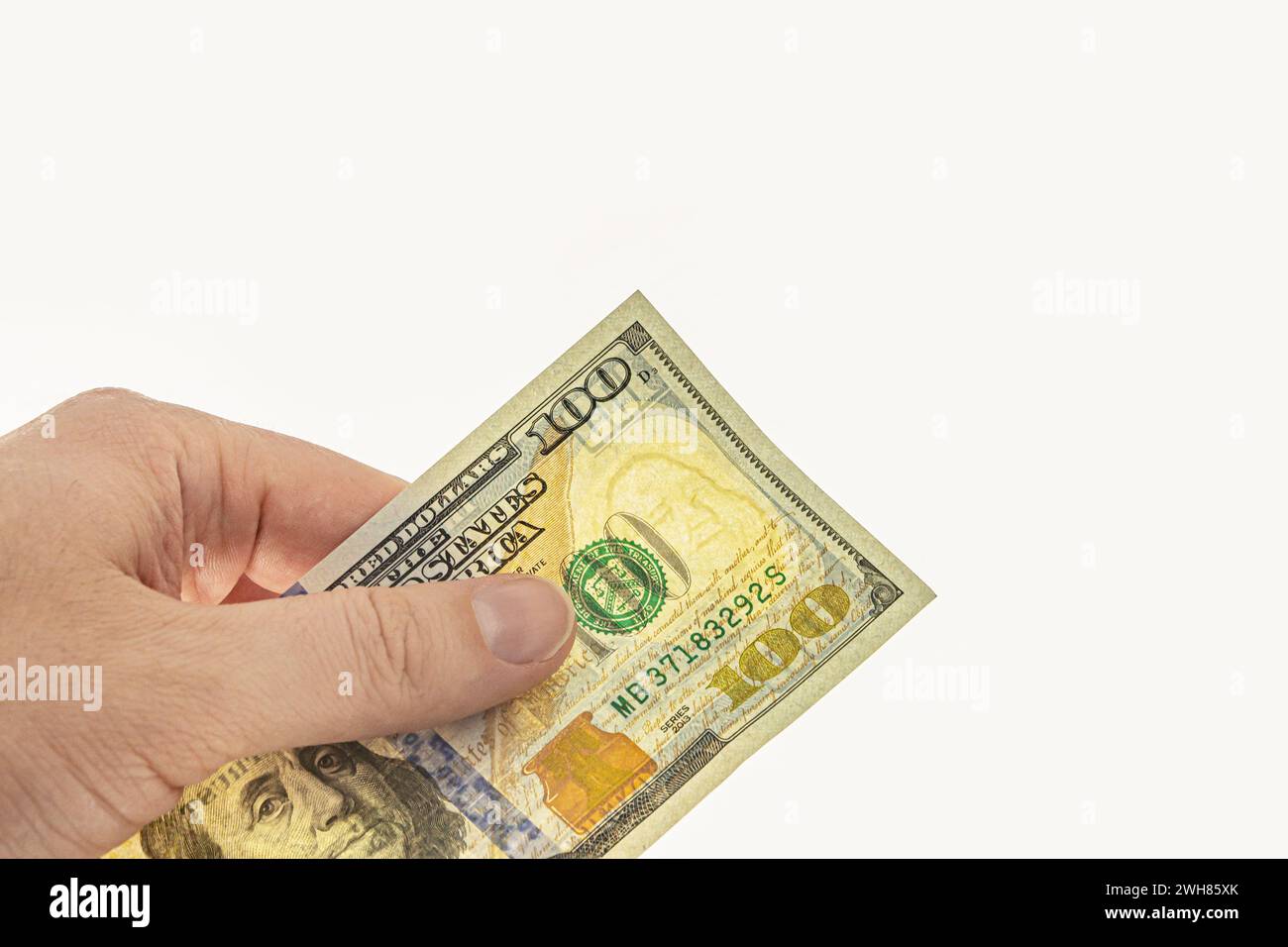 Authentication of banknote 100 dollars for clearance. Watermarks on a ...