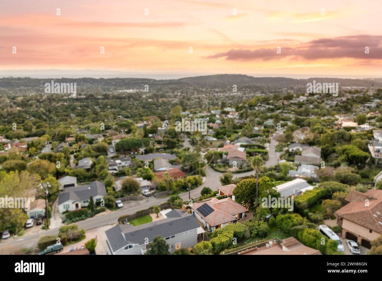 Colorful suburban houses at sunset Stock Photo - Alamy