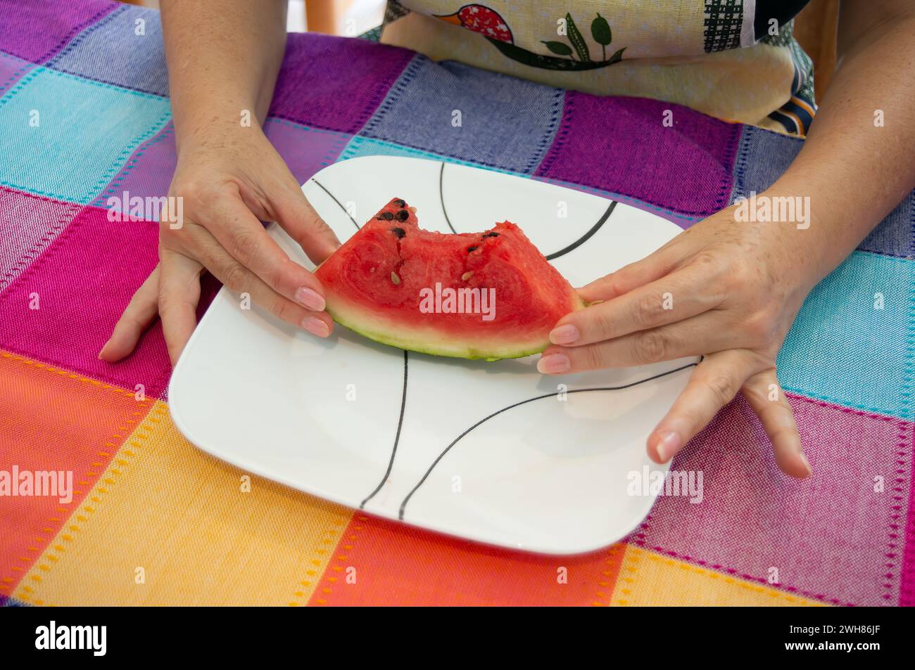 Hands Cuting and Holding a Delicious Watermelon Ready to Eat Stock ...