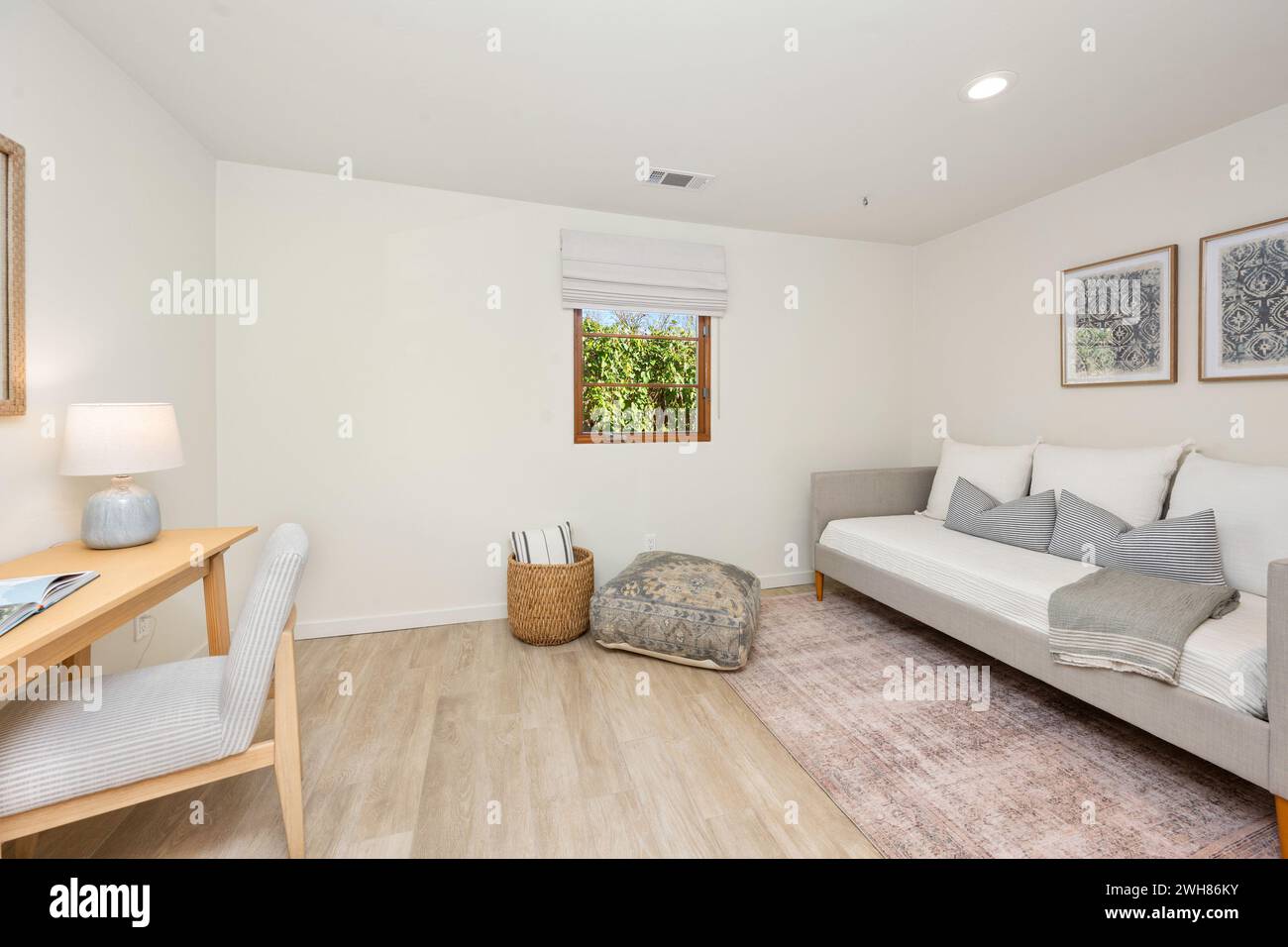 A tranquil space with soothing hues, featuring white walls, wooden ...