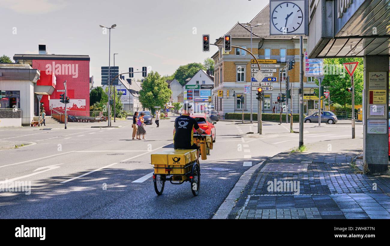 German Postman delivers mail and packages on a modified tricycle ...