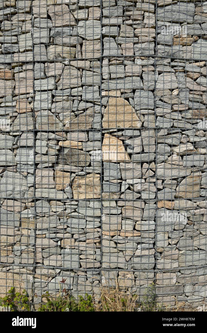 Gabion wall stone in metal wire box cage Stock Photo - Alamy