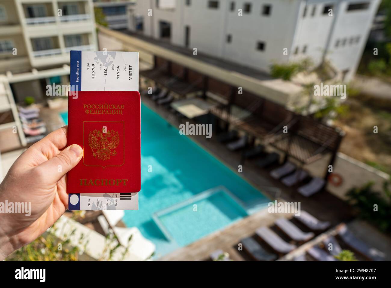 Man holding boarding pass ticket hi-res stock photography and images - Alamy