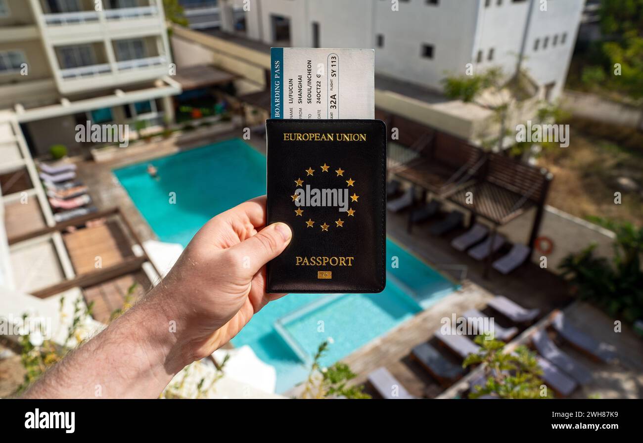 Man holding boarding pass ticket hi-res stock photography and images - Alamy