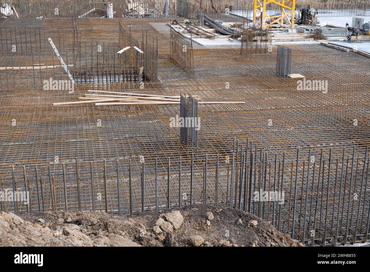 Beginning Laborers metal work on the construction site. Reinforcing ...
