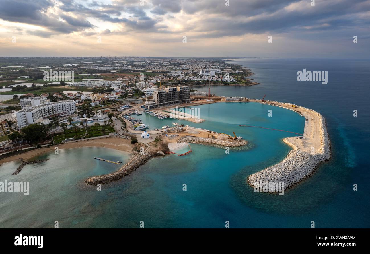 Drone aerial scenery of marina under construction at sunset. Paralimni ...