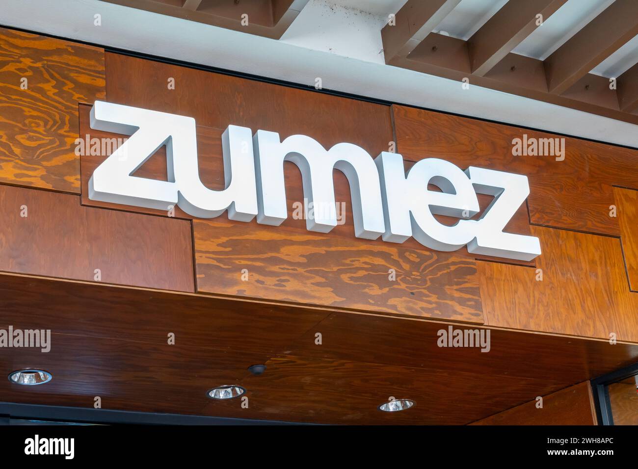 Close-up of Zumiez logo sign at their store in a shopping mall in ...