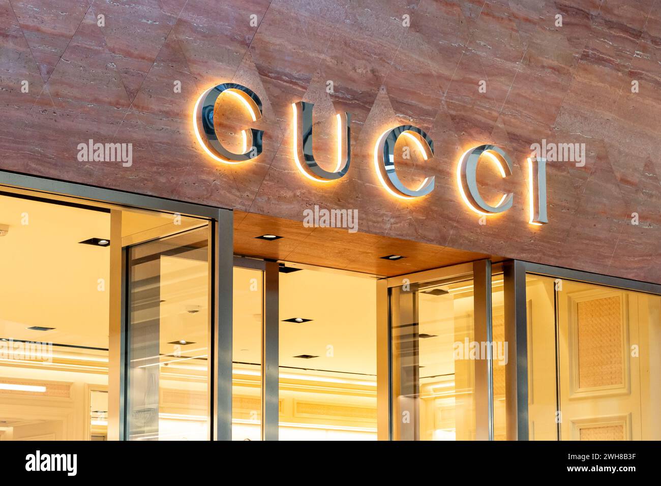 Close-up of Gucci logo sign at their store in a shopping mall Stock ...