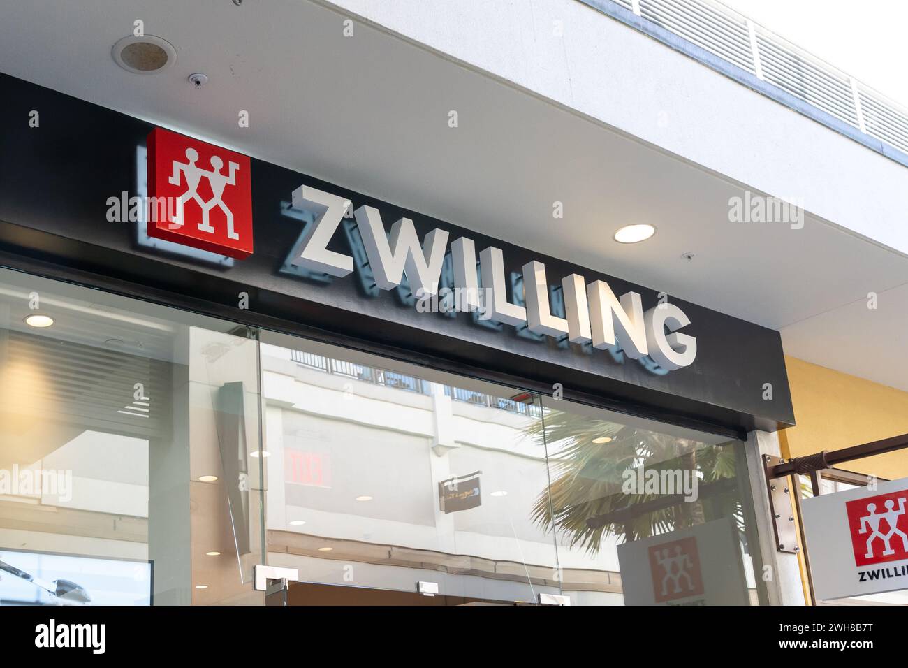 Zwilling store logo sign closeup in a shopping mall in Waikiki, Hawaii Stock Photo - Alamy