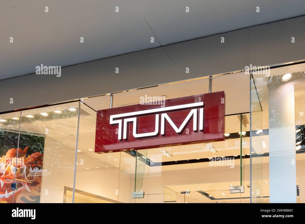 A Tumi logo sign at their store in a shopping mall in Waikiki, Hawaii Stock Photo - Alamy