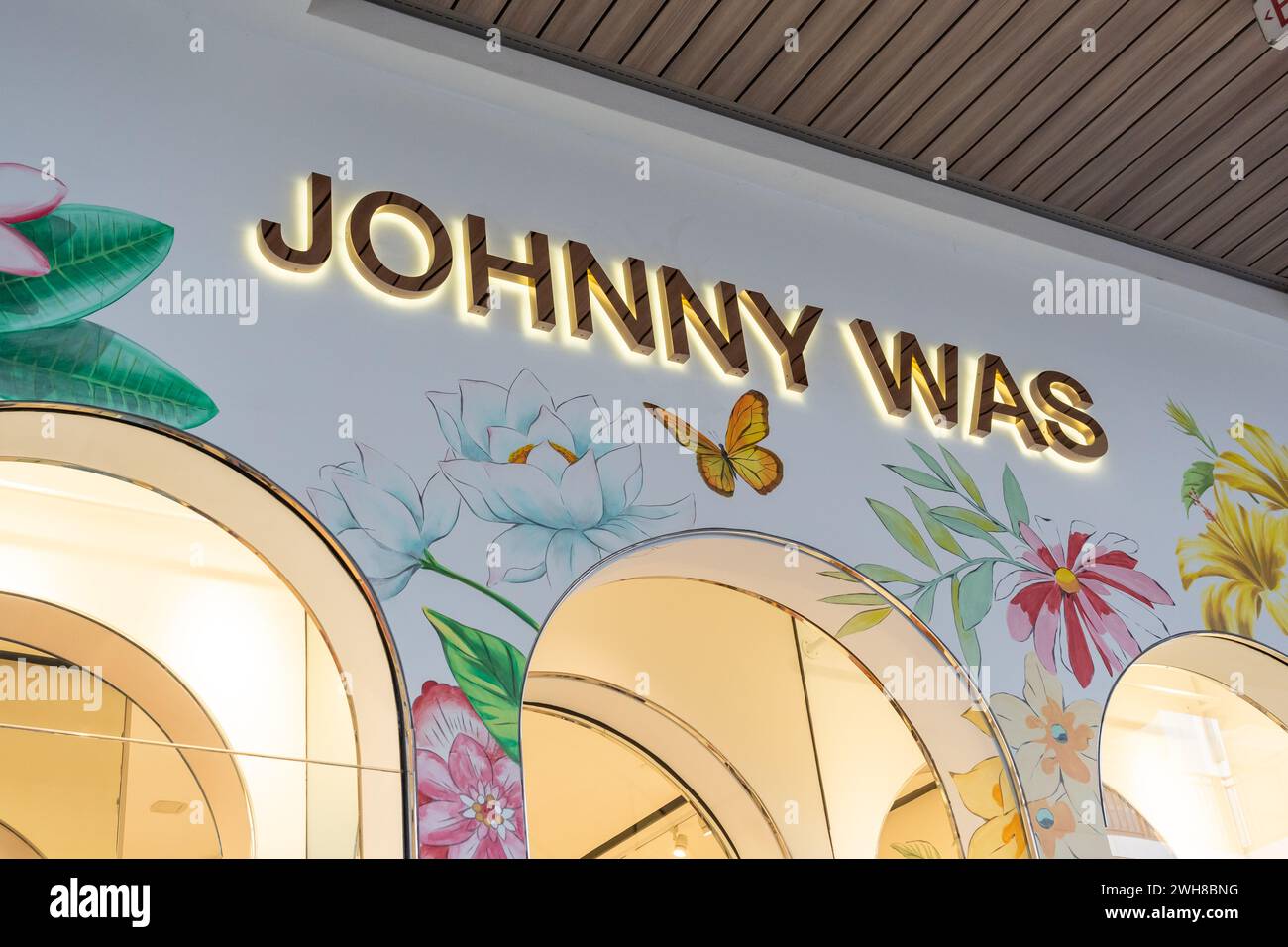 Close-up of Johnny Was logo sign at their store in a shopping mall in ...