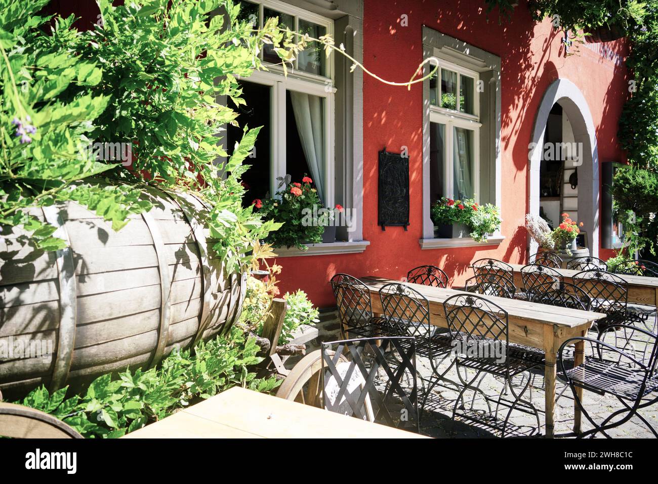 Peaceful and inviting outdoor patio in front of an old wine bar and ...