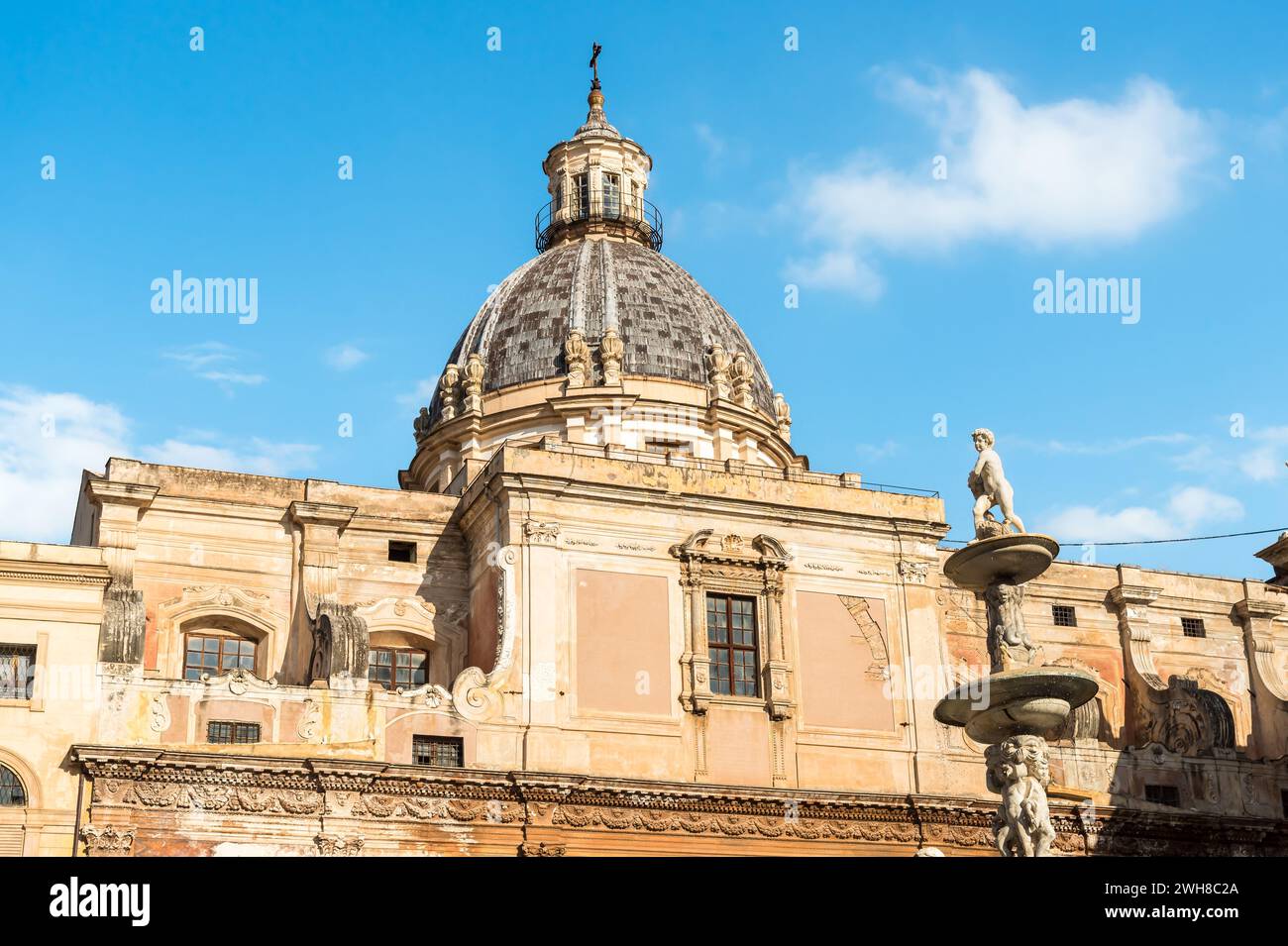 View of Saint Catherine church dome with the marble statue of the ...