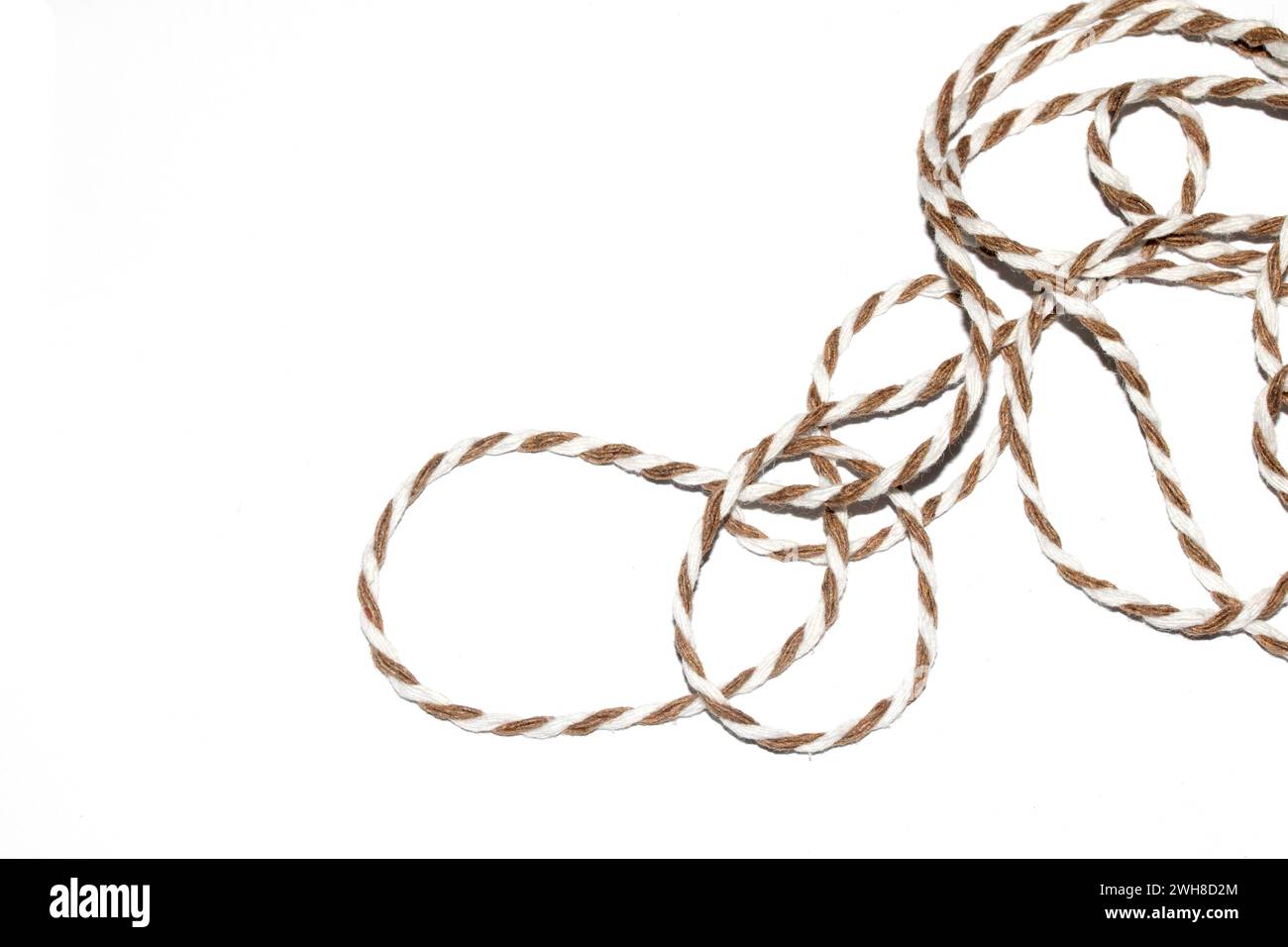 A Wrapping Paper Stripy String Rope Close Up on White Background Stock ...