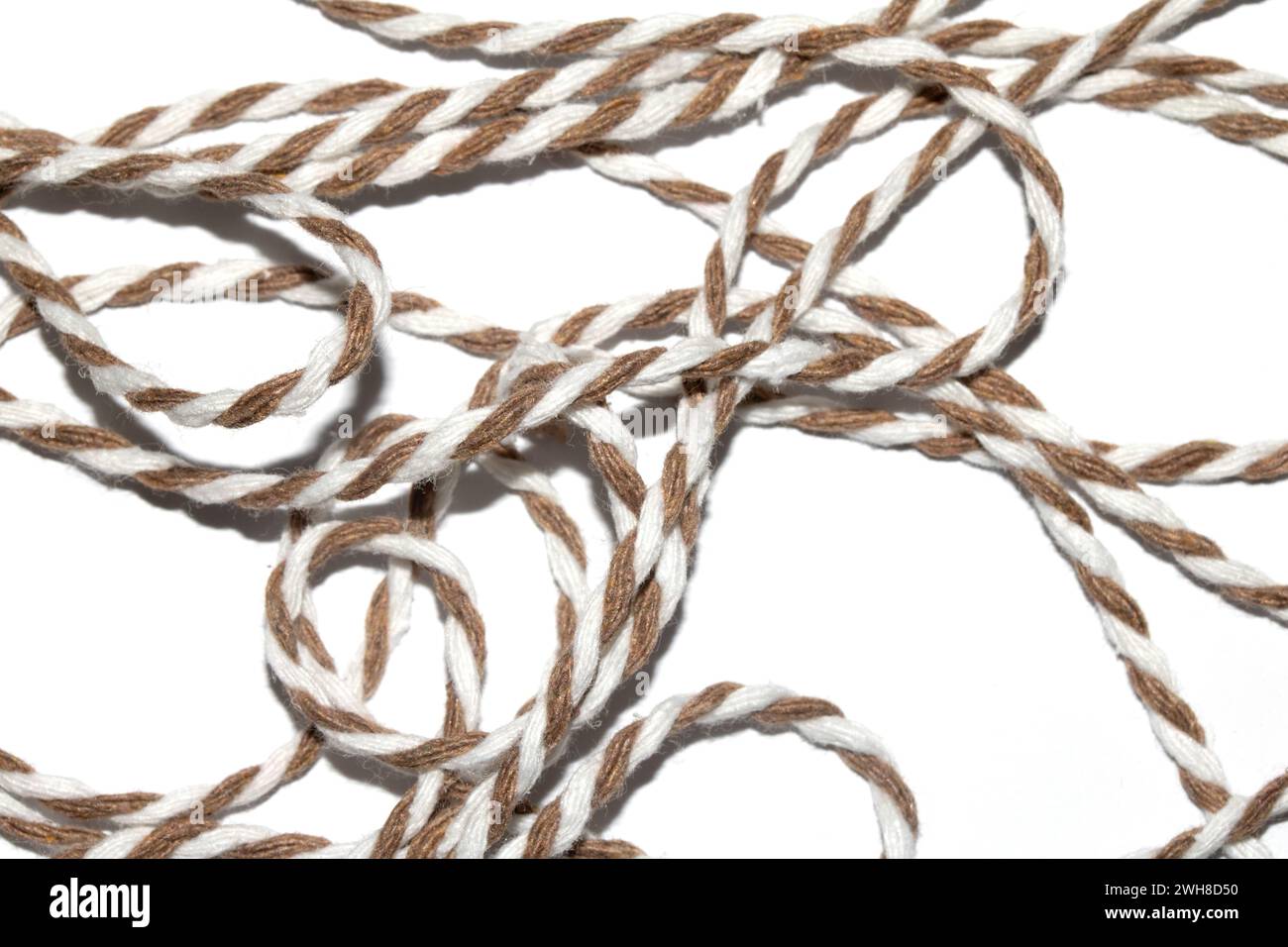 A Wrapping Paper Stripy String Rope Close Up on White Background Stock ...