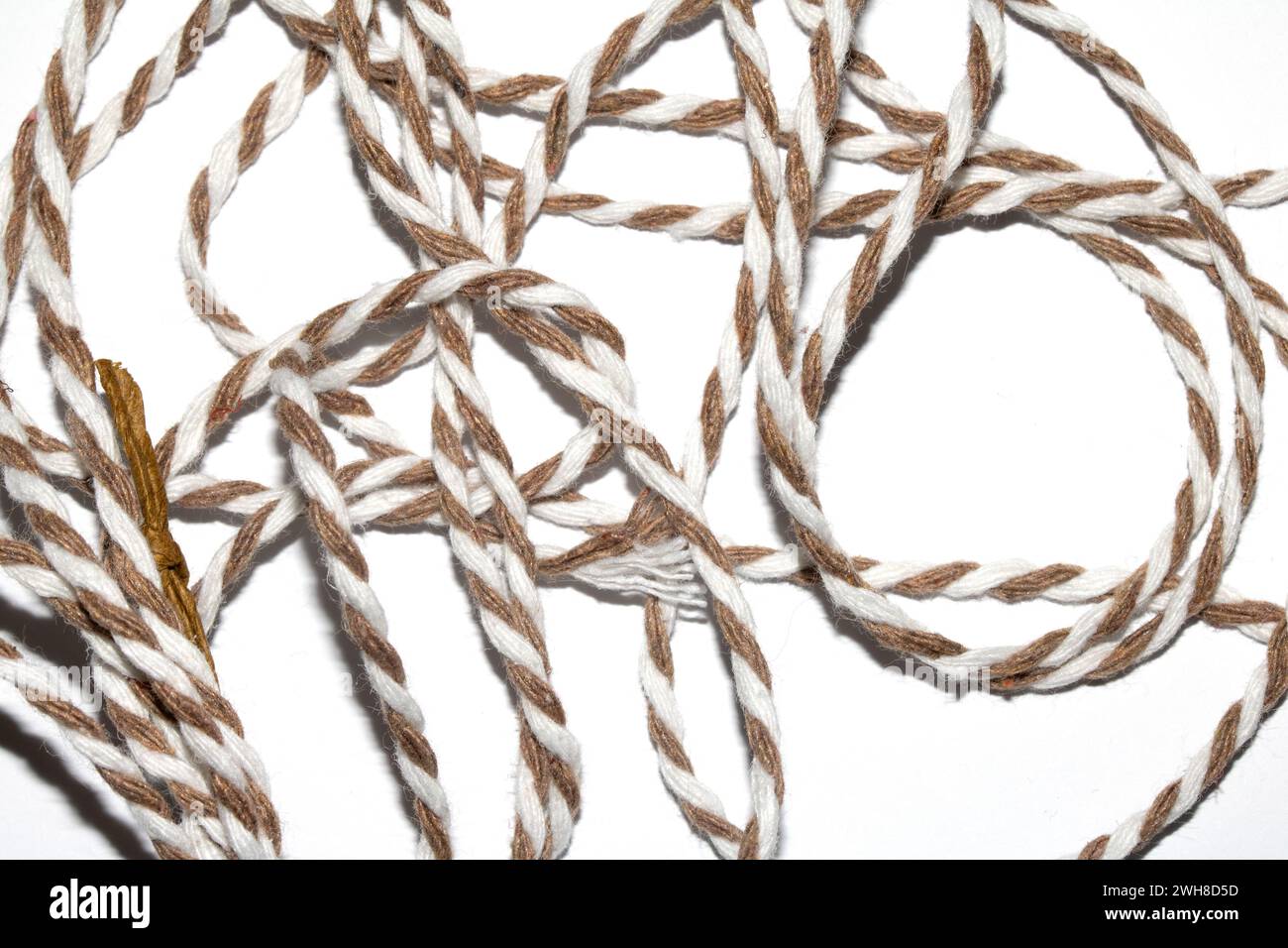 A Wrapping Paper Stripy String Rope Close Up on White Background Stock ...