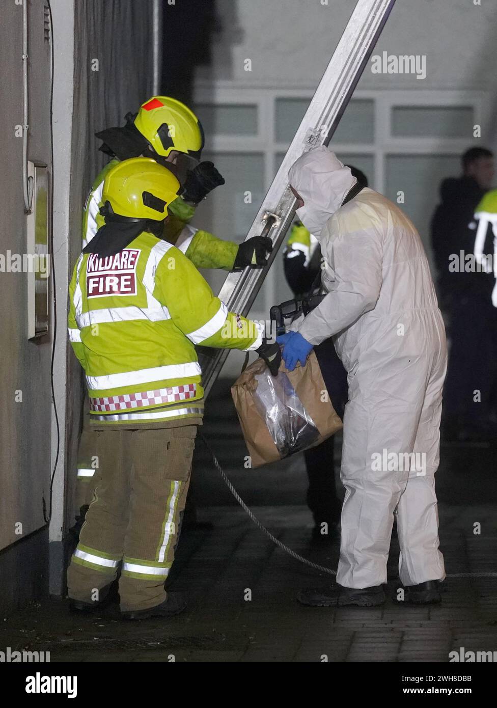 Garda forensic officers and firefighters at the scene in School Street ...