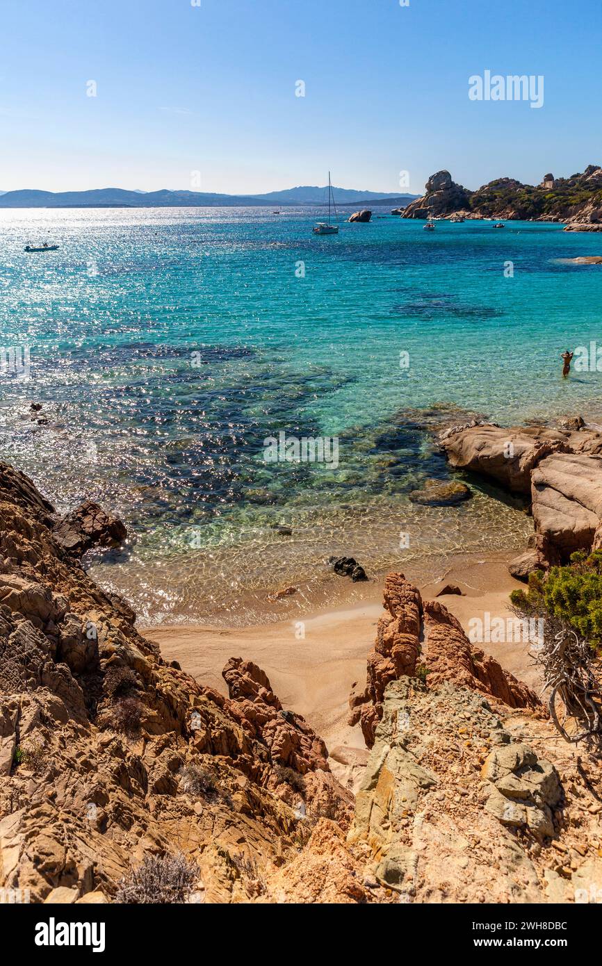 Woman enjoying the sea at Cala Corsara cove on the island of Spargi in ...