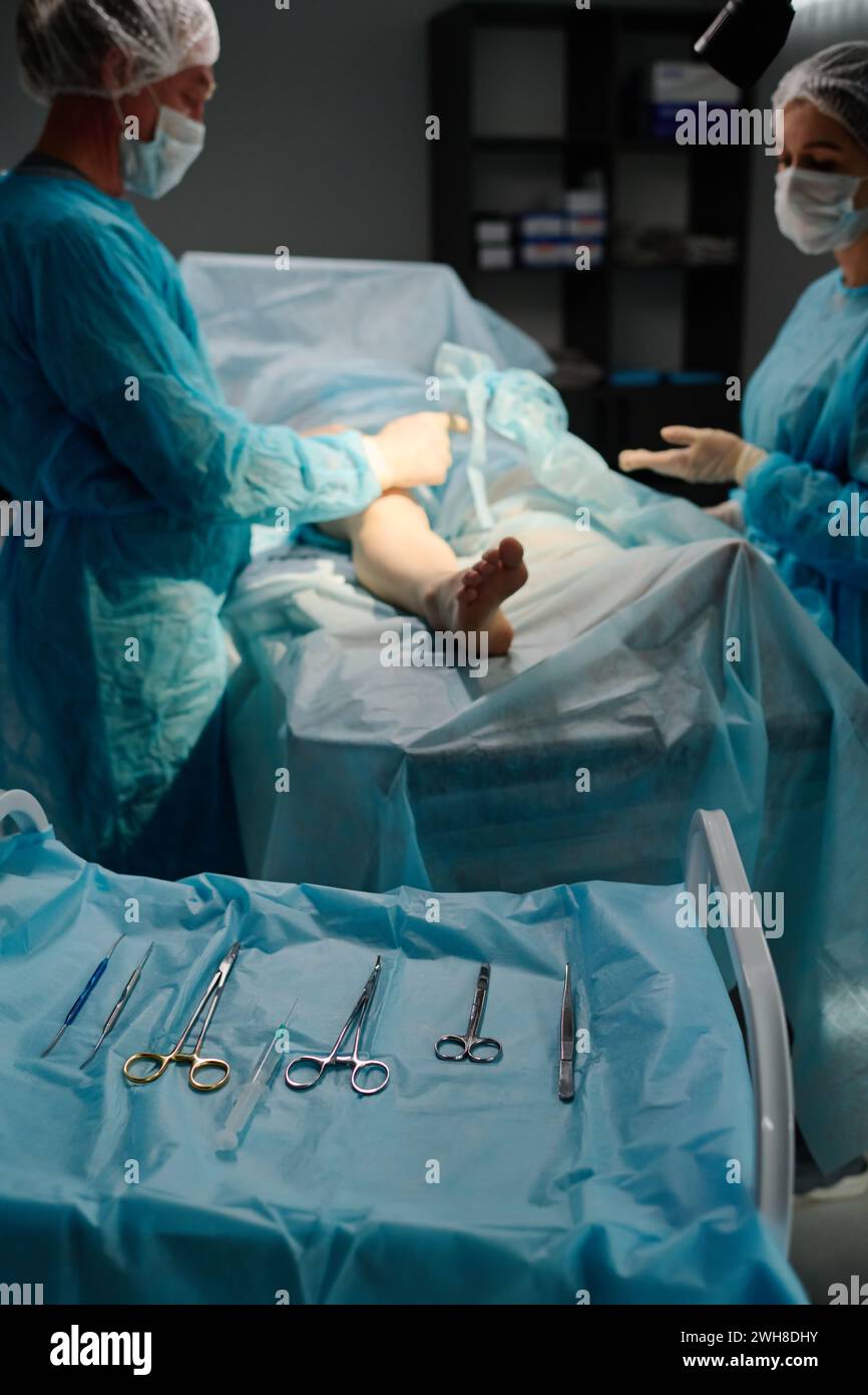 Woman in blue medical scrubs hi-res stock photography and images - Alamy