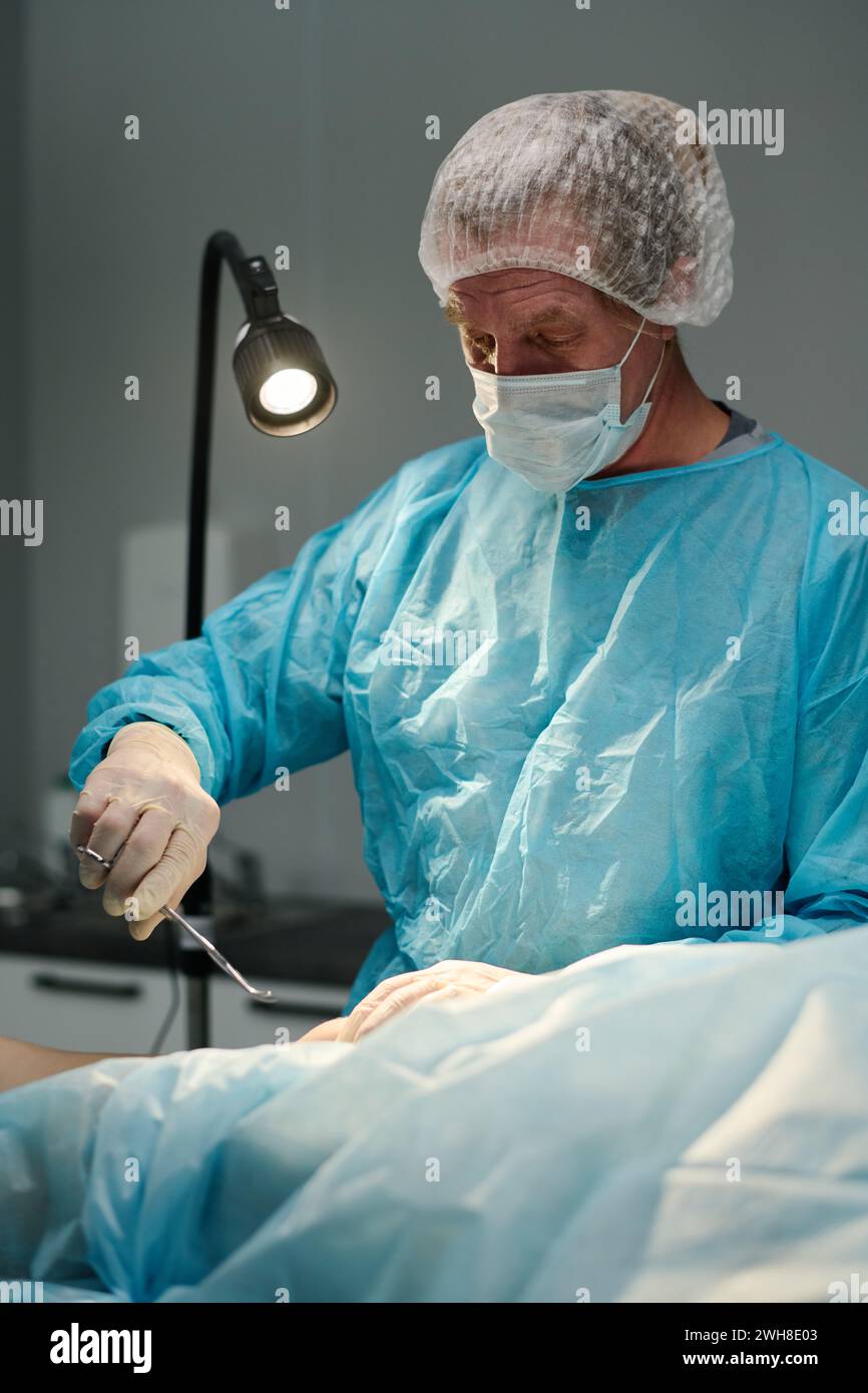 Mature clinician in protective hi-res stock photography and images - Alamy