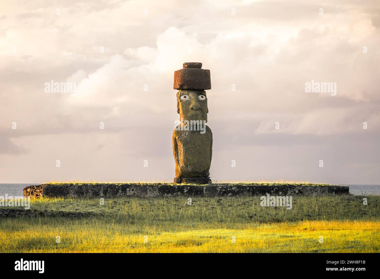 The seeing moai of Ahu Tahai with its coral eyes and red hat, the pukau ...