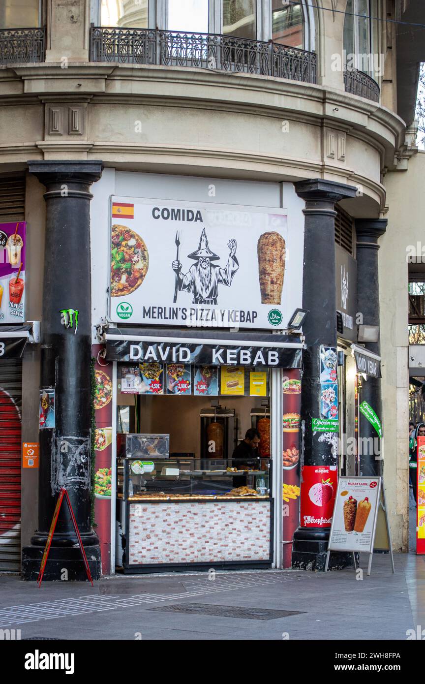 VALENCIA, SPAIN - FEBRUARY 2, 2024: Merlin's pizza and kebab restaurant ...