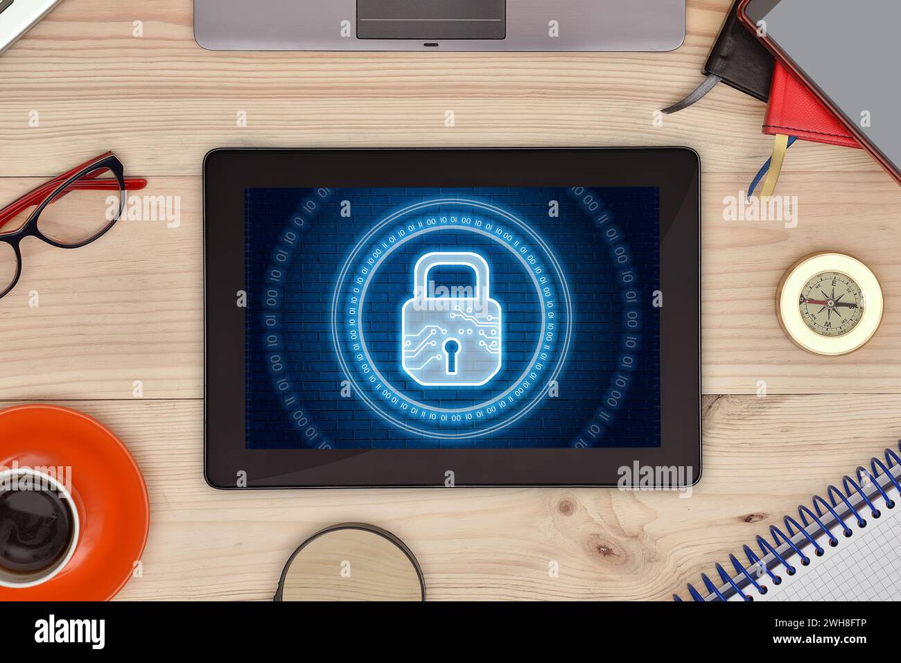 Tablet computer and digital lock icon hologram with circle binary numders on screen. Cyber ...