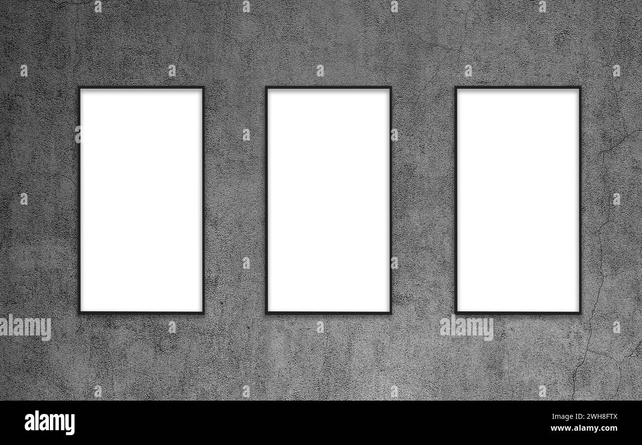 Three empty posters on wall in concrete room. Art and promotion ...