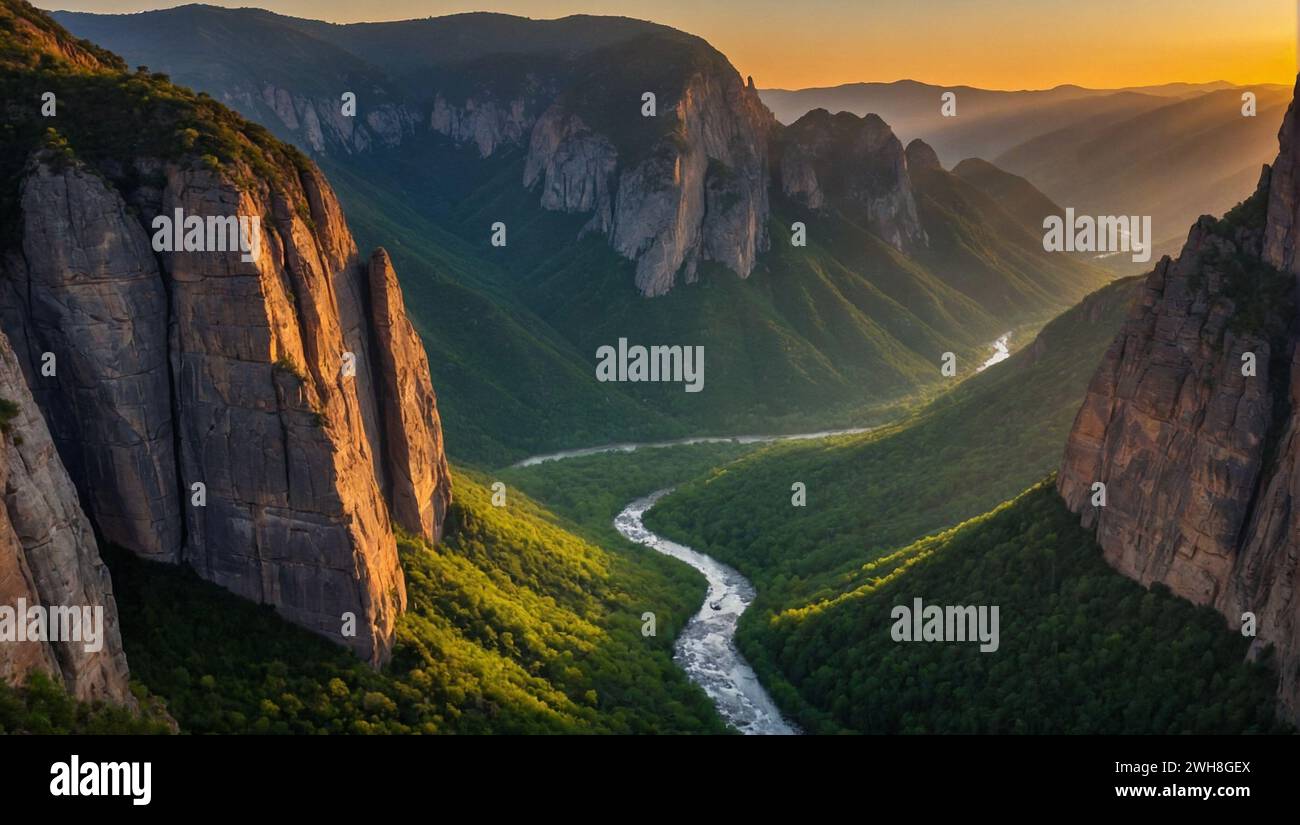 Glowing sunrise over a winding river through a deep valley flanked by ...