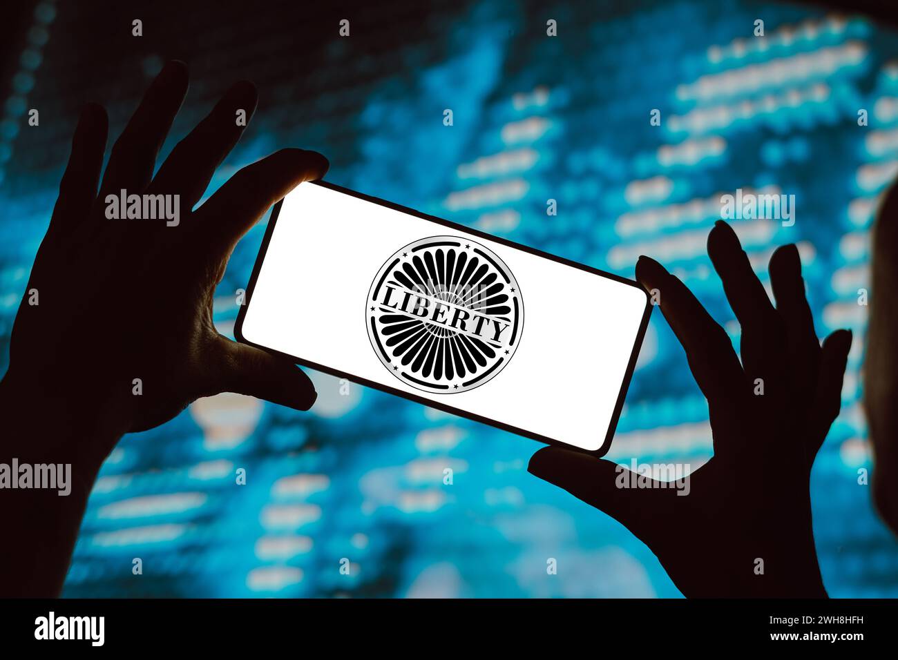 In this photo illustration, the Liberty Media Corporation logo is ...