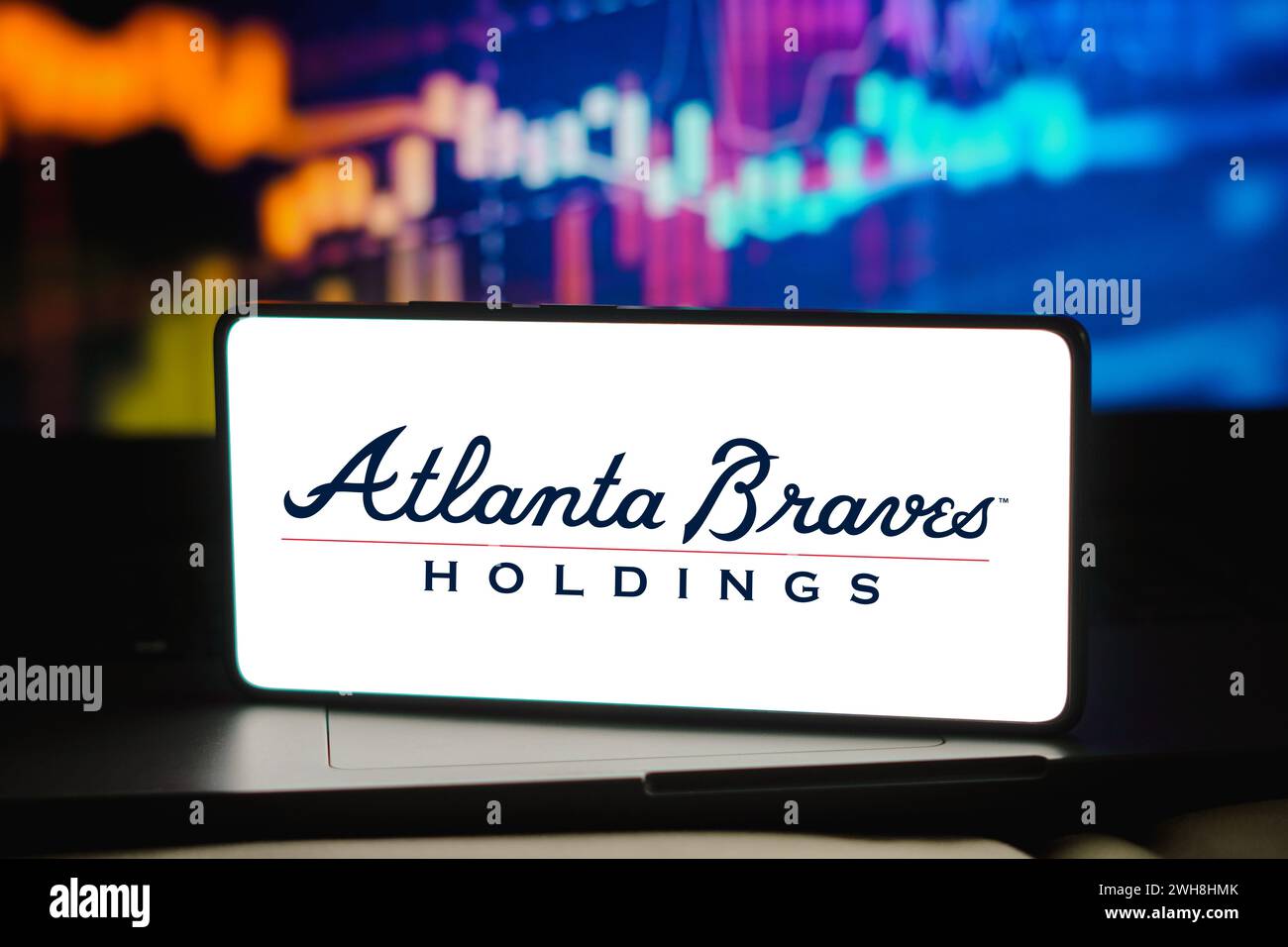In this photo illustration, the Atlanta Braves Holdings logo is ...