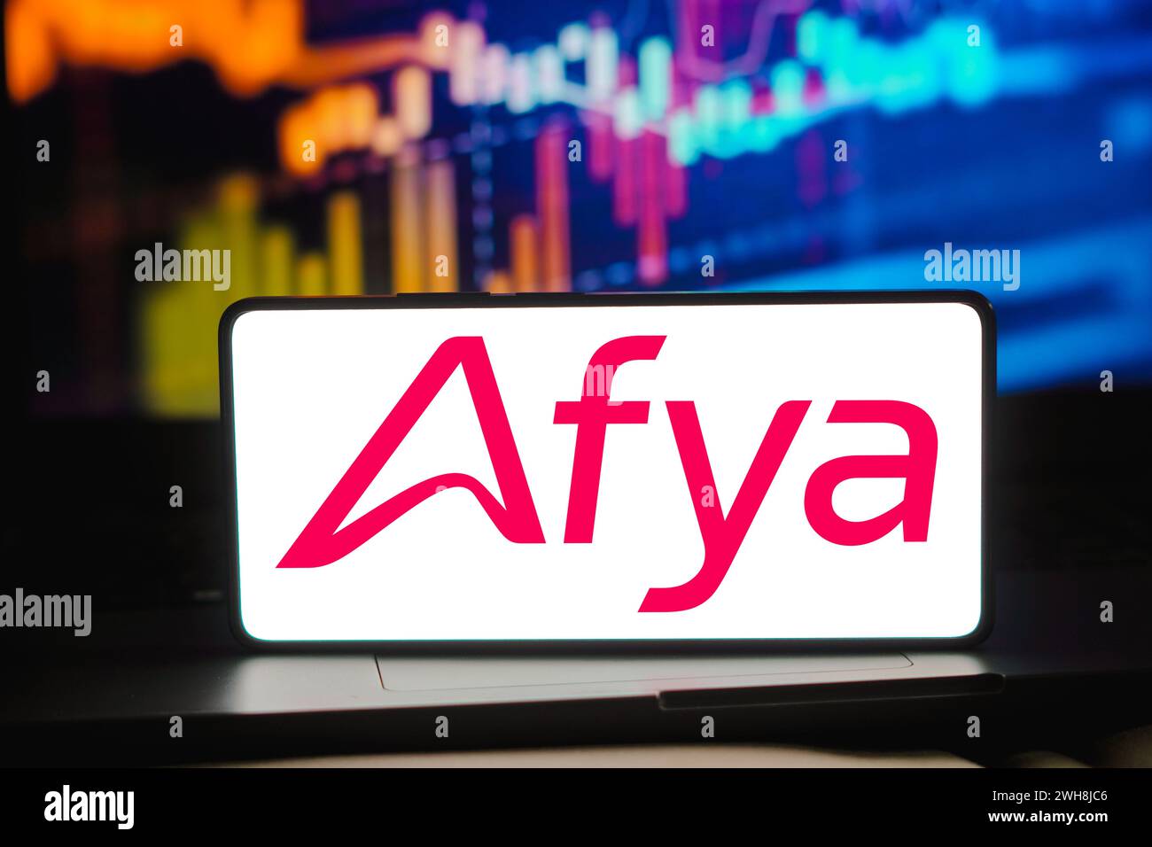 In this photo illustration, the Afya Limited logo is displayed on a ...
