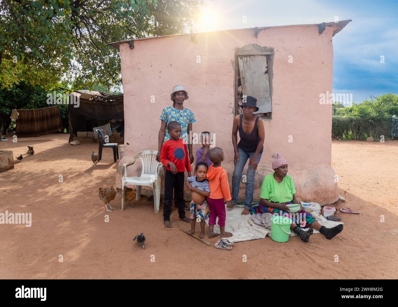 village, group of african kids together with the parents and granny in ...