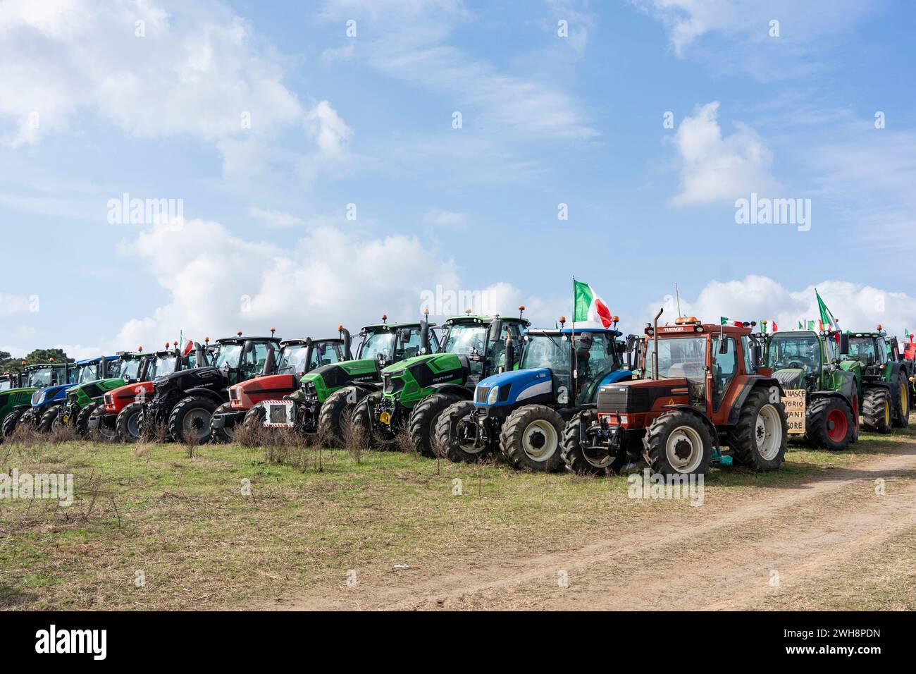 Rome, Italy. 08th Feb, 2024. Tractors are parked in a field near Rome's ...